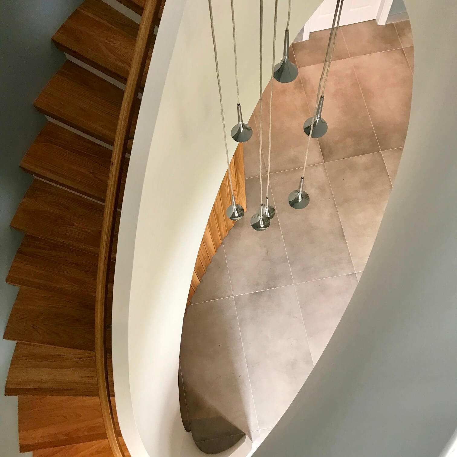 Elliptical Curved Concrete Staircase with Oak Finishes & LED | Ireland ...