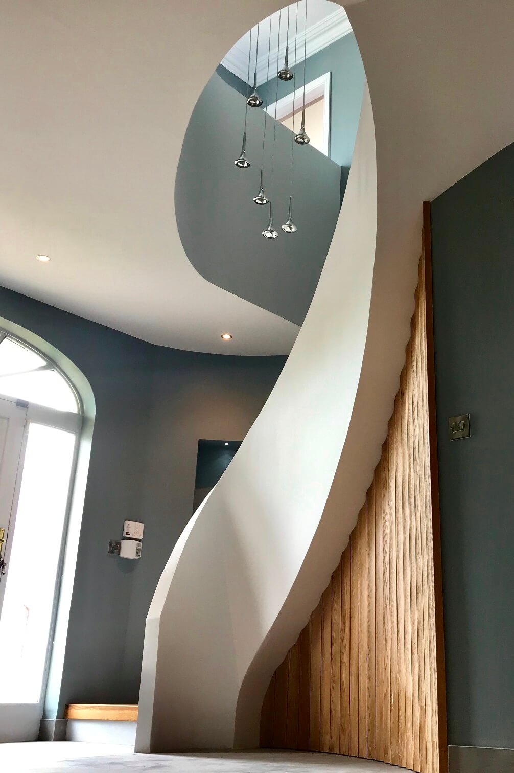 Elliptical Curved Concrete Staircase with Oak Finishes & LED | Ireland ...