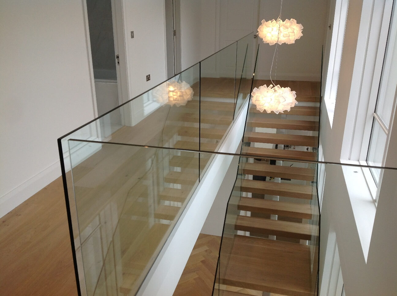 European Oak Staircase with Glass Balustrade | Cork & Nationwide in Ireland