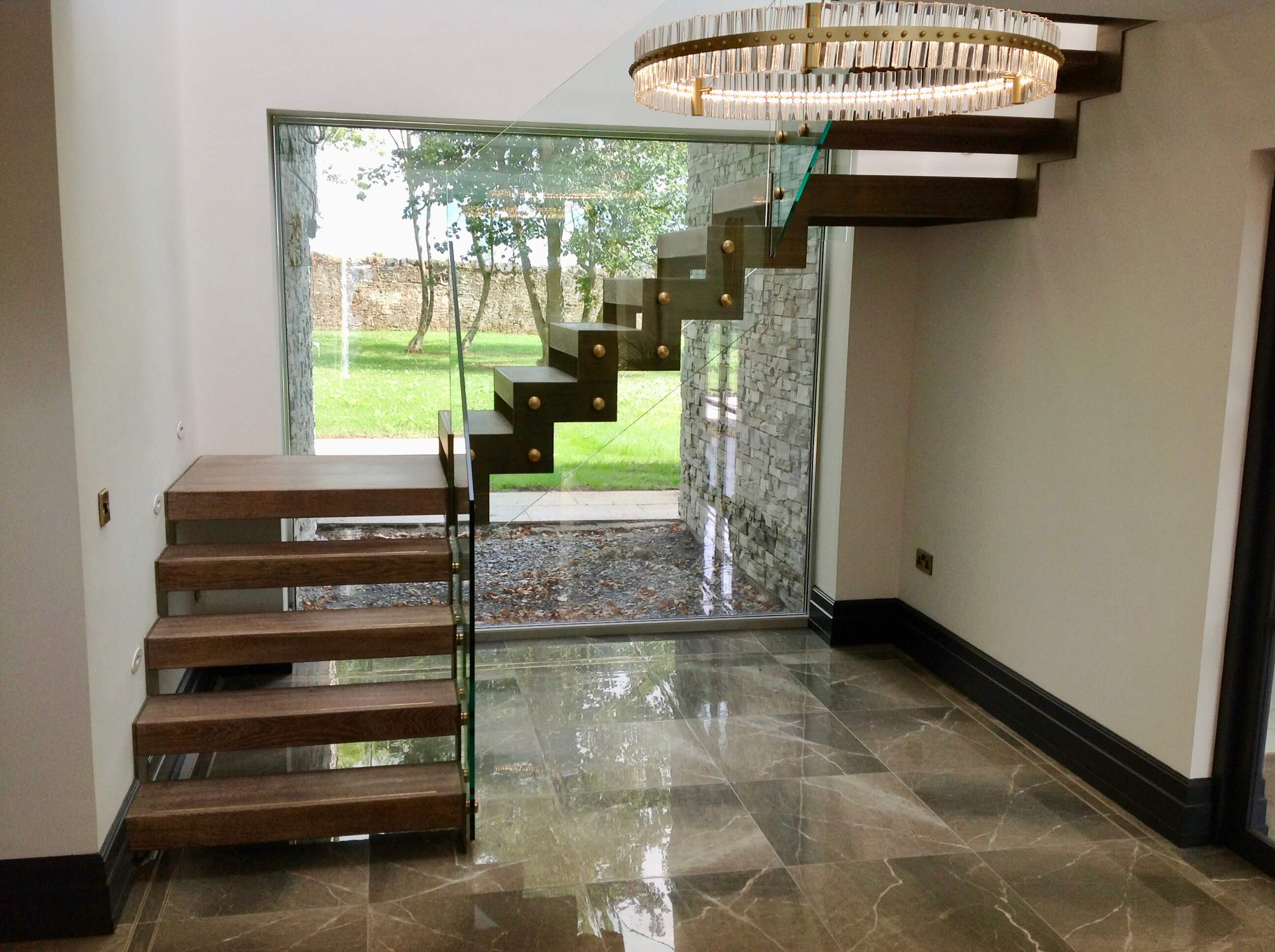 Brass & Oak Stepped Soffit Staircase | Custom Staircases Across Ireland