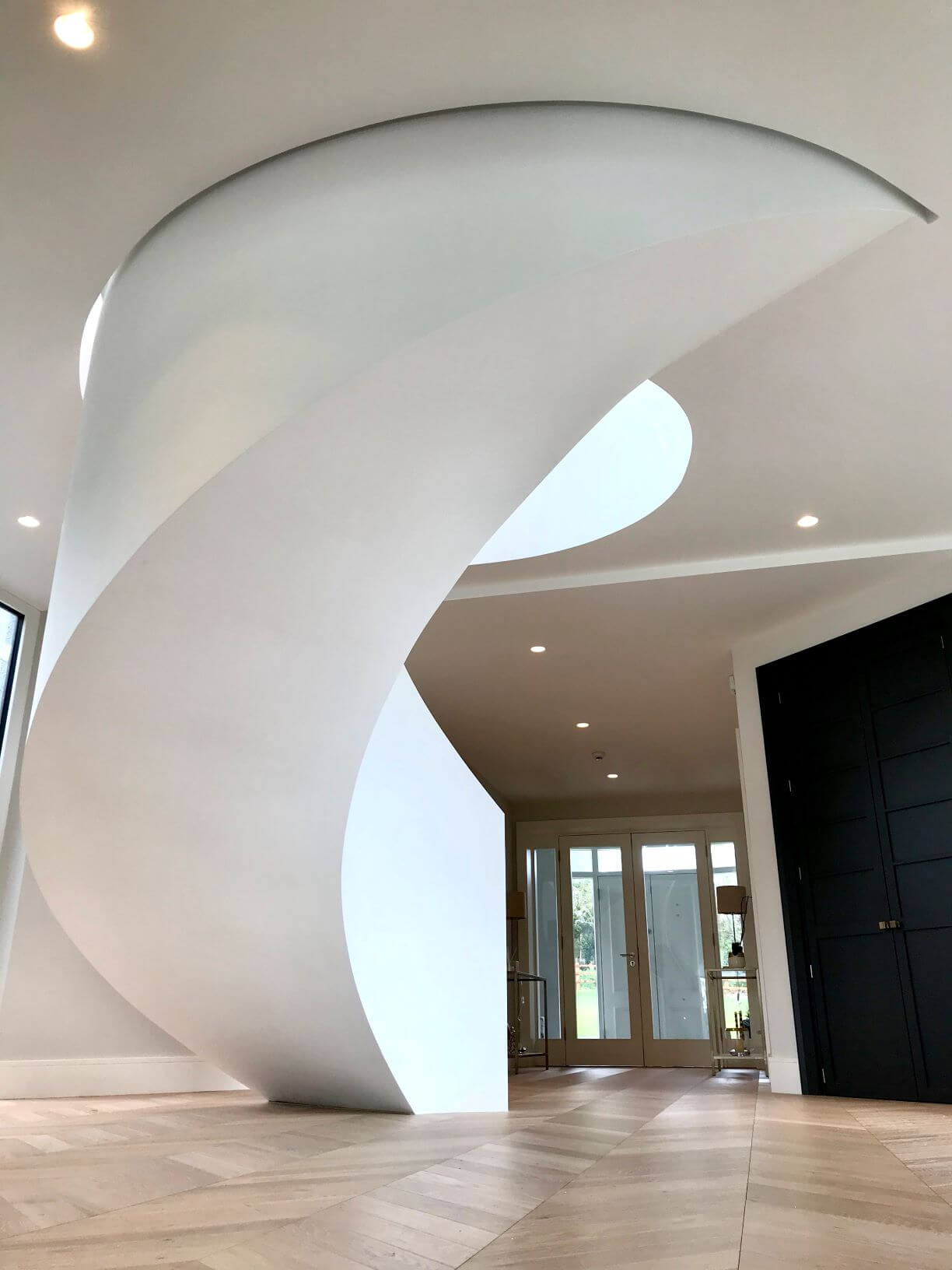 Bespoke Curved Concrete Staircase with Oak Cladding & Glass Balustrade ...