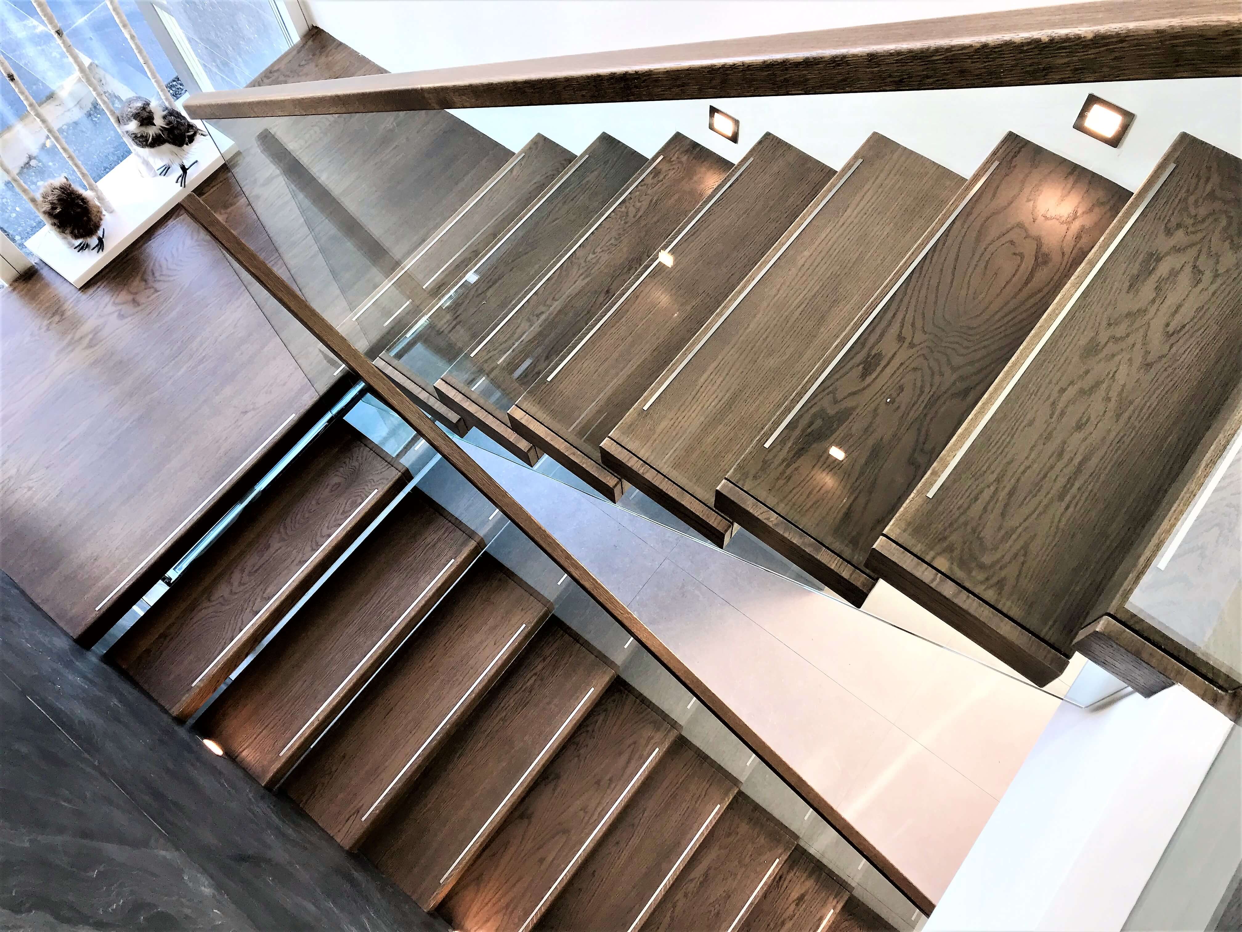 Floating dark oak stairs with glass balustrade - Floating Stairs ...