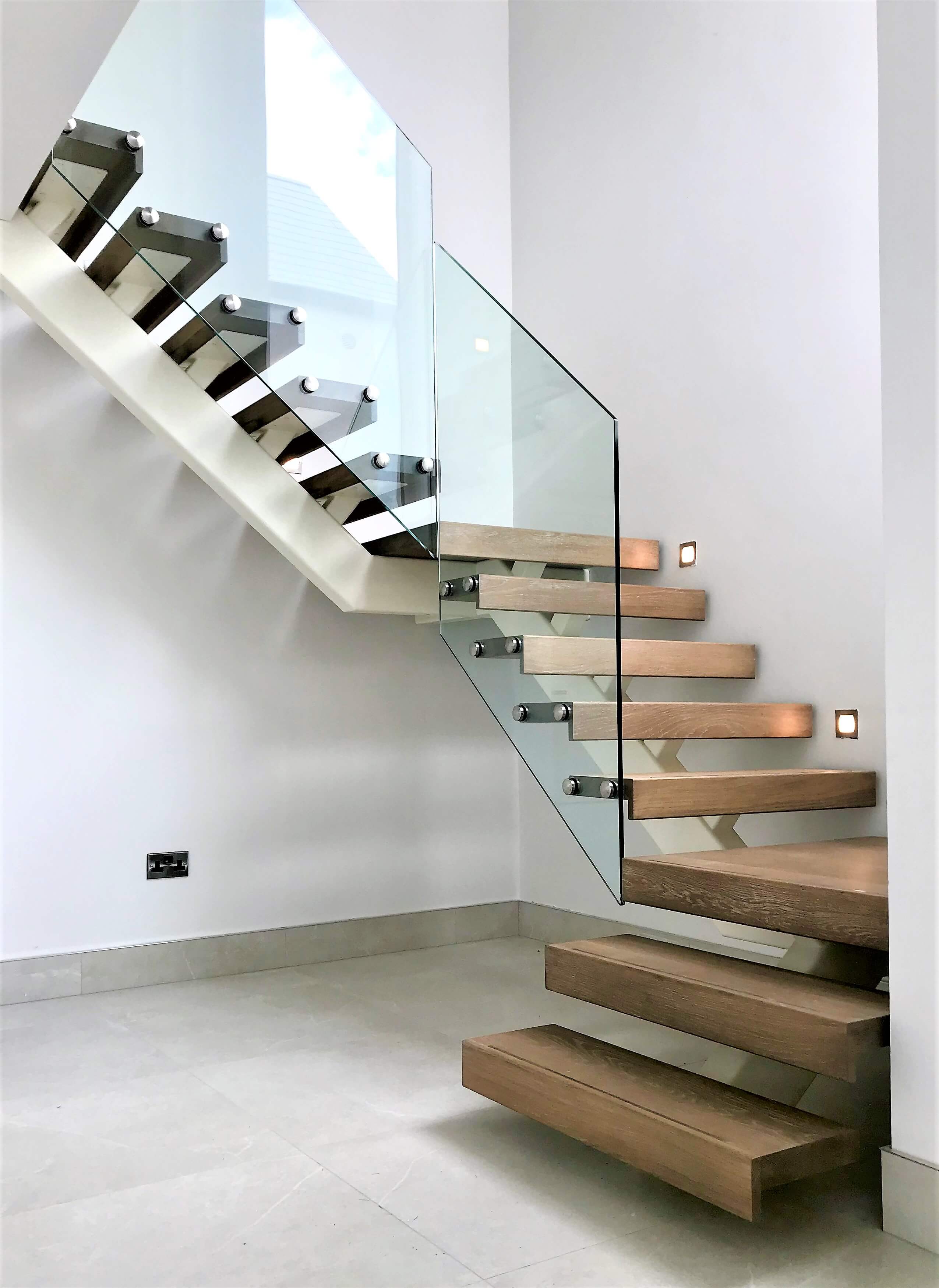 Ivory steel spine stairs with toughened glass balustrade - Bespoke ...