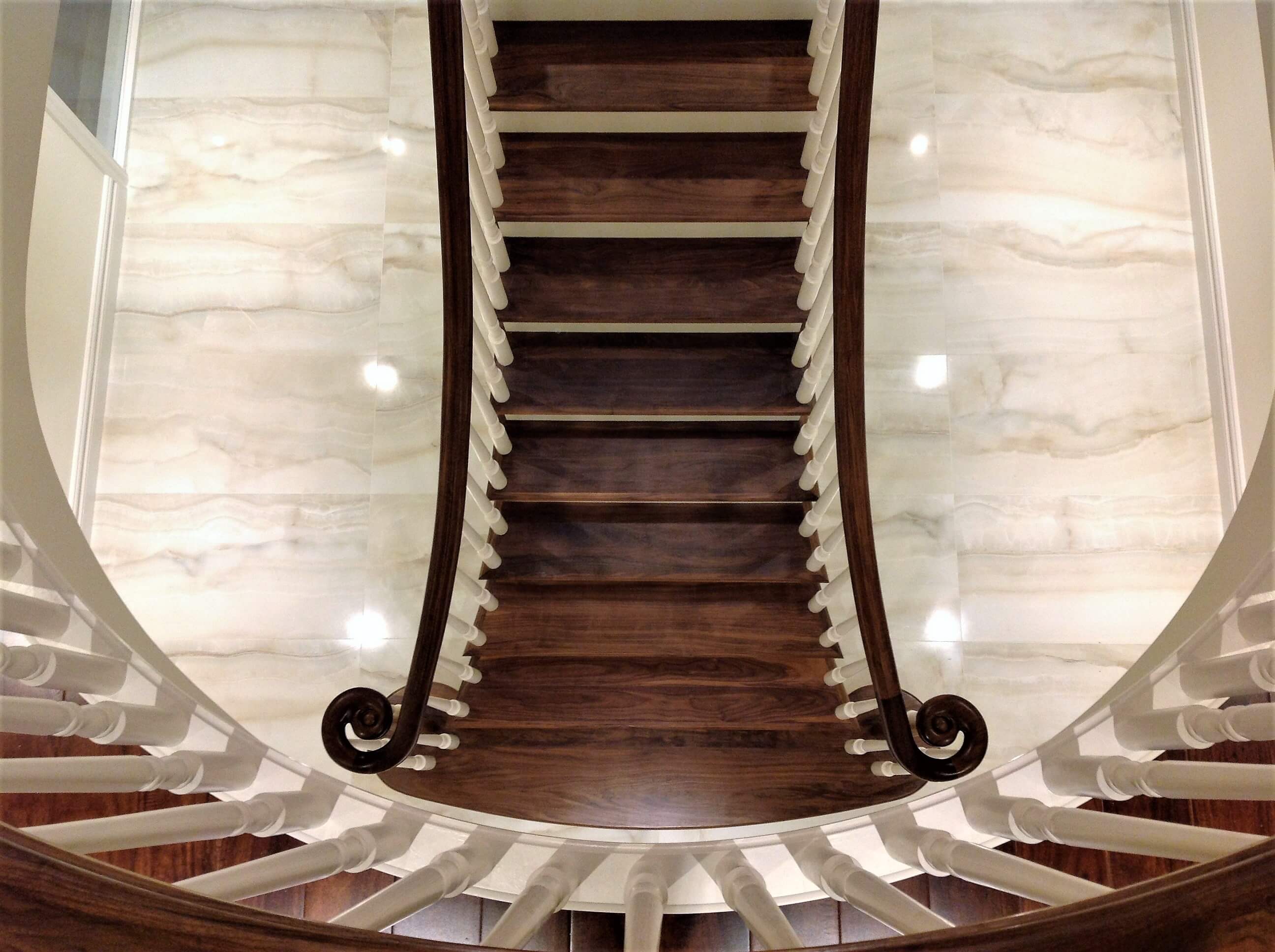 Flared walnut and ivory stairs with curved landing - Concrete flared ...