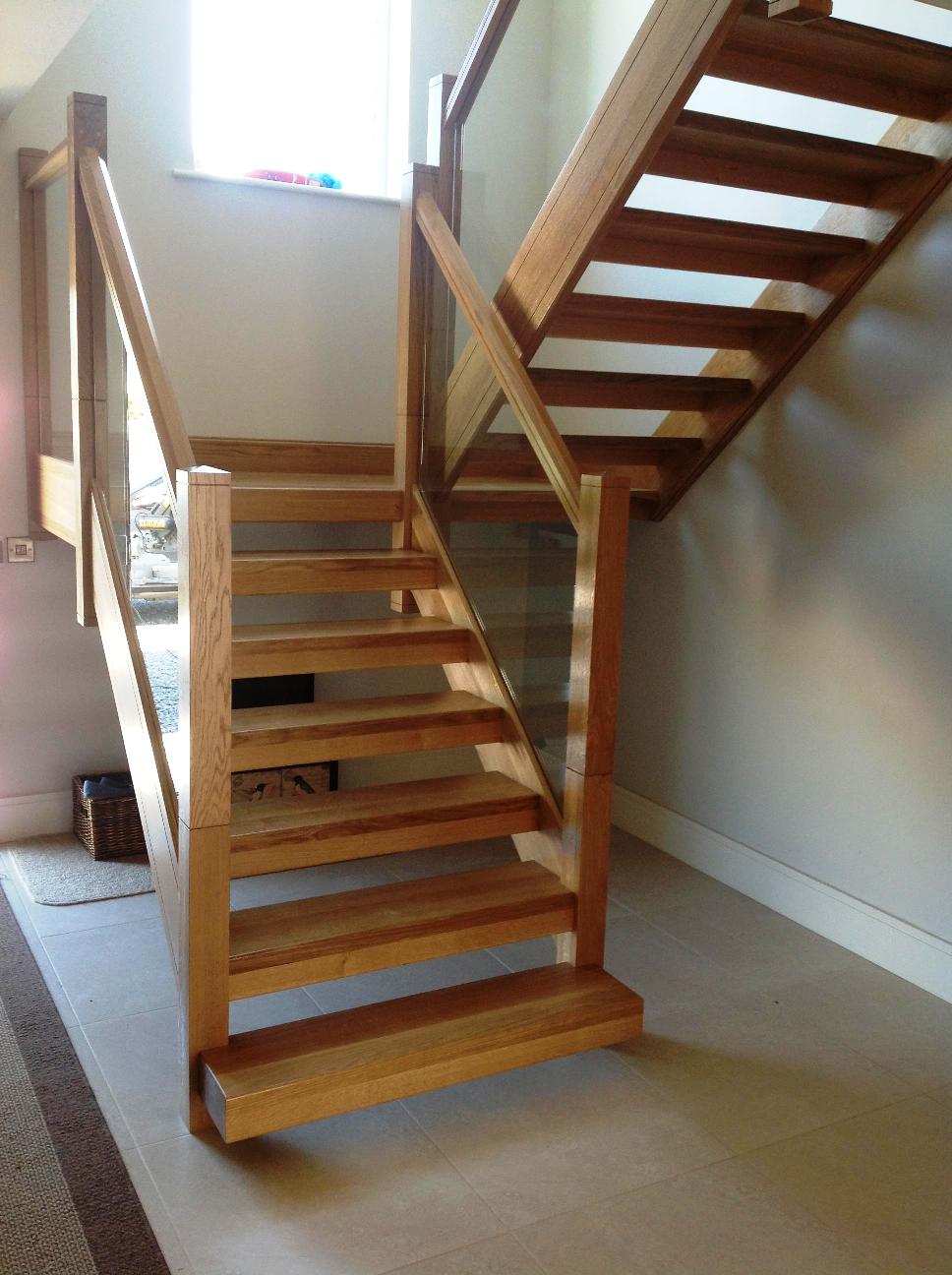 European oak open rise stairs with inset glass balustrades